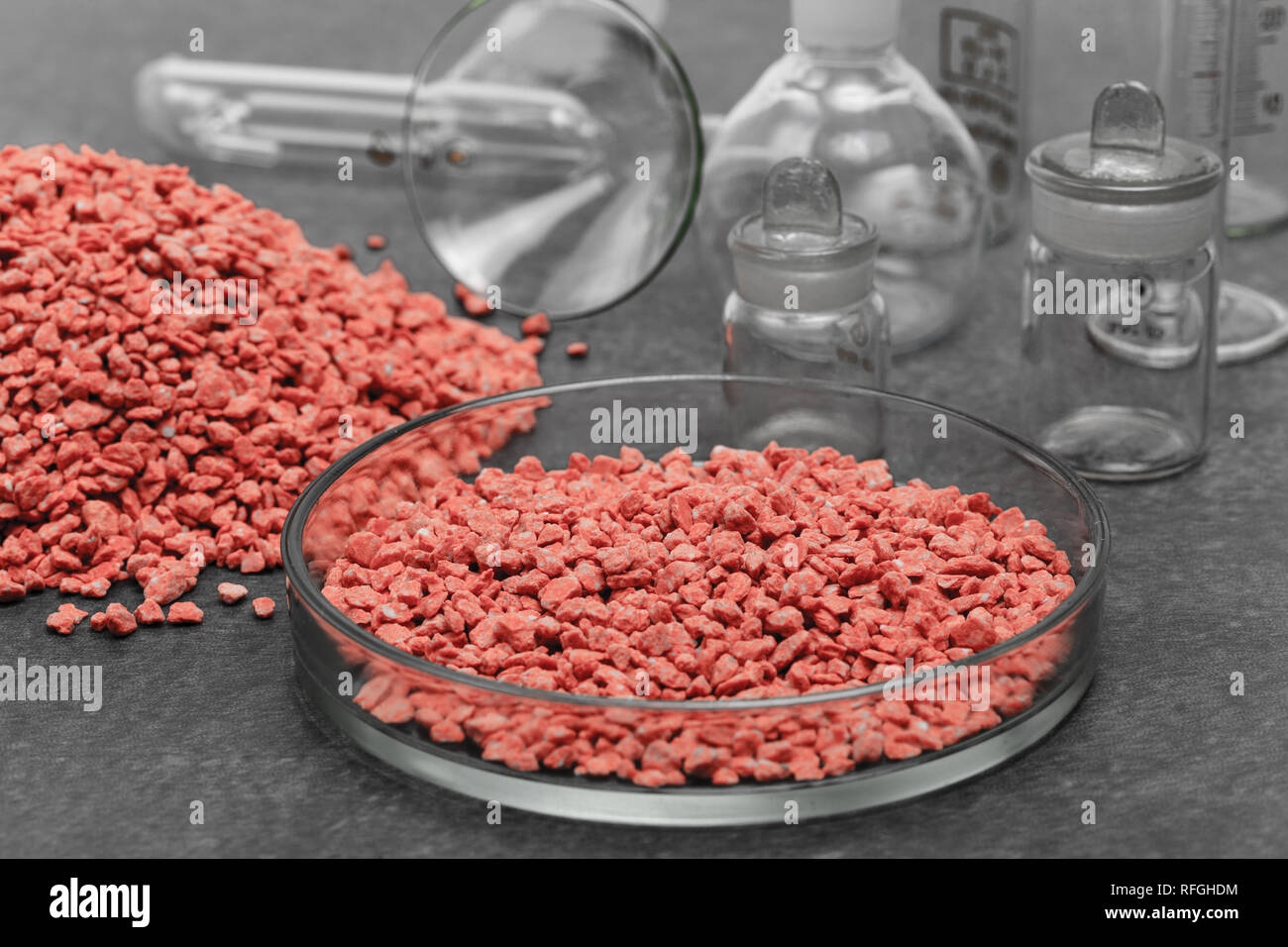 Mineral fertilizer with phosphorus in red with chemical glass Stock ...