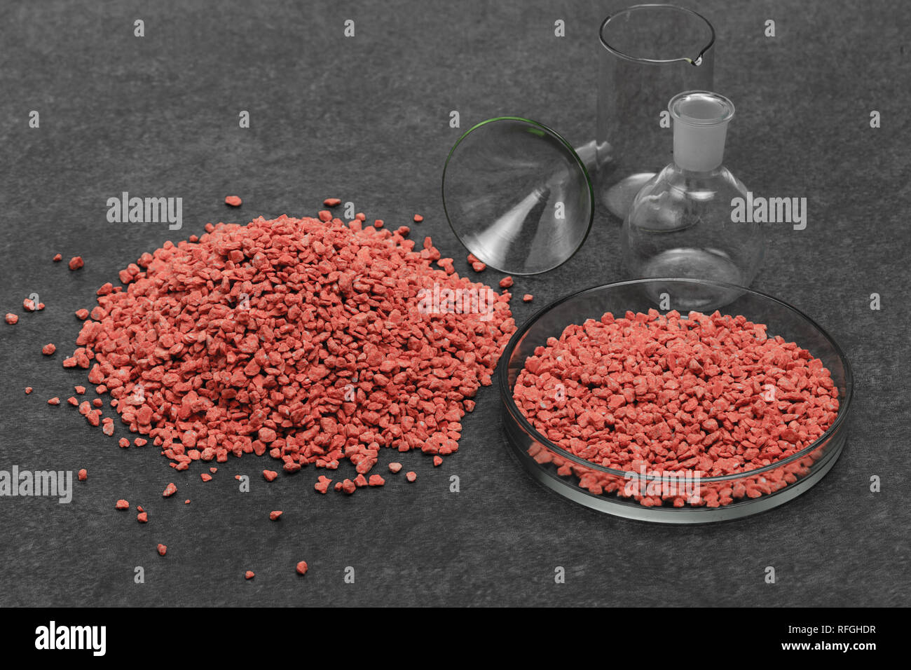 Mineral fertilizer with phosphorus in red with chemical glass Stock ...