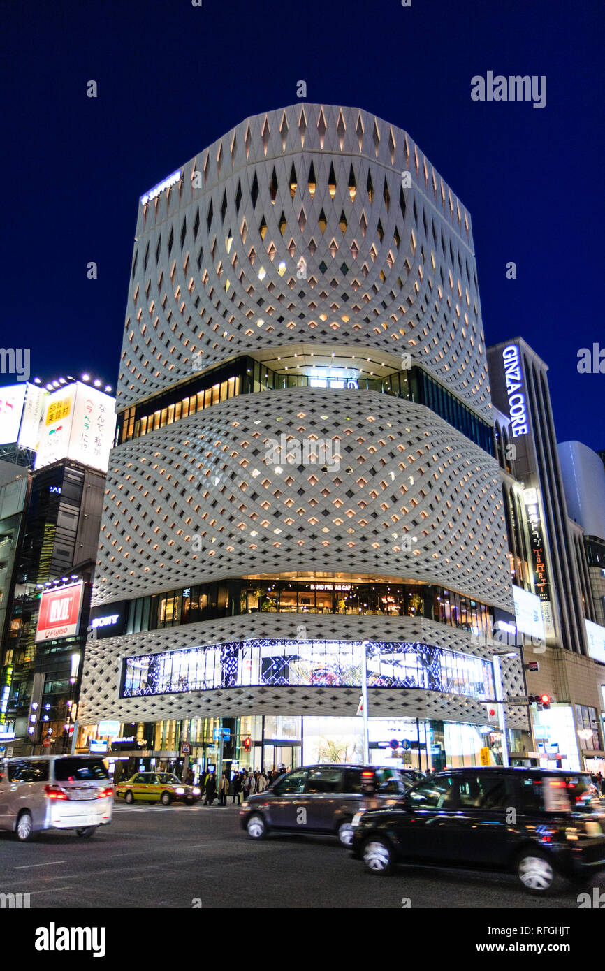 The white Ginza Place building with aluminium panel facade during blue ...