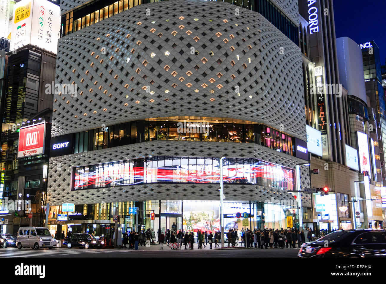 Close up of the white Ginza Place building with aluminium panel facade ...