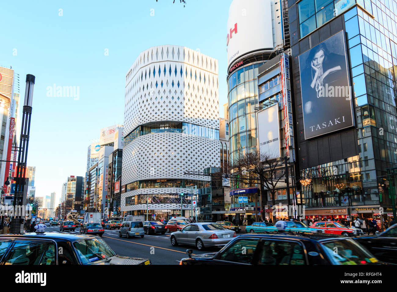 The white Ginza Place building and its aluminium panel facade. General ...