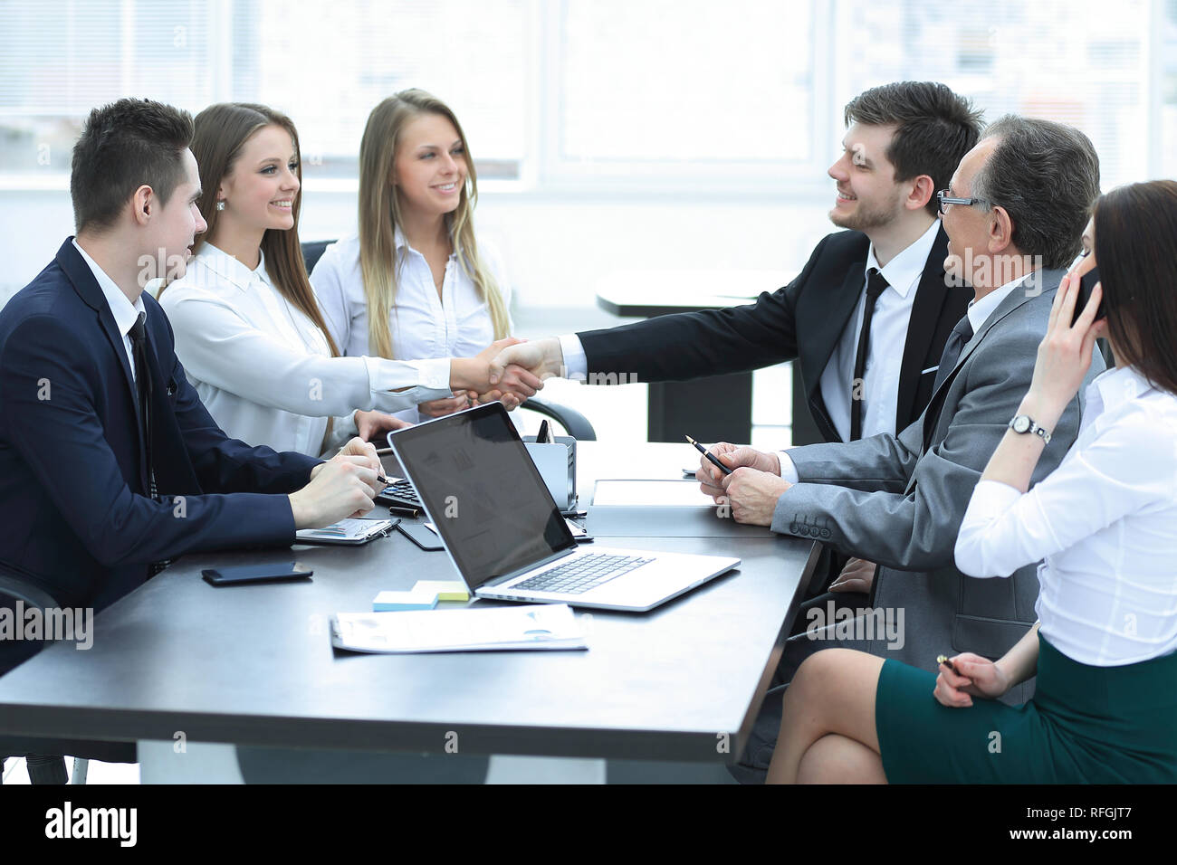 business partners shaking hands after a successful transaction Stock ...
