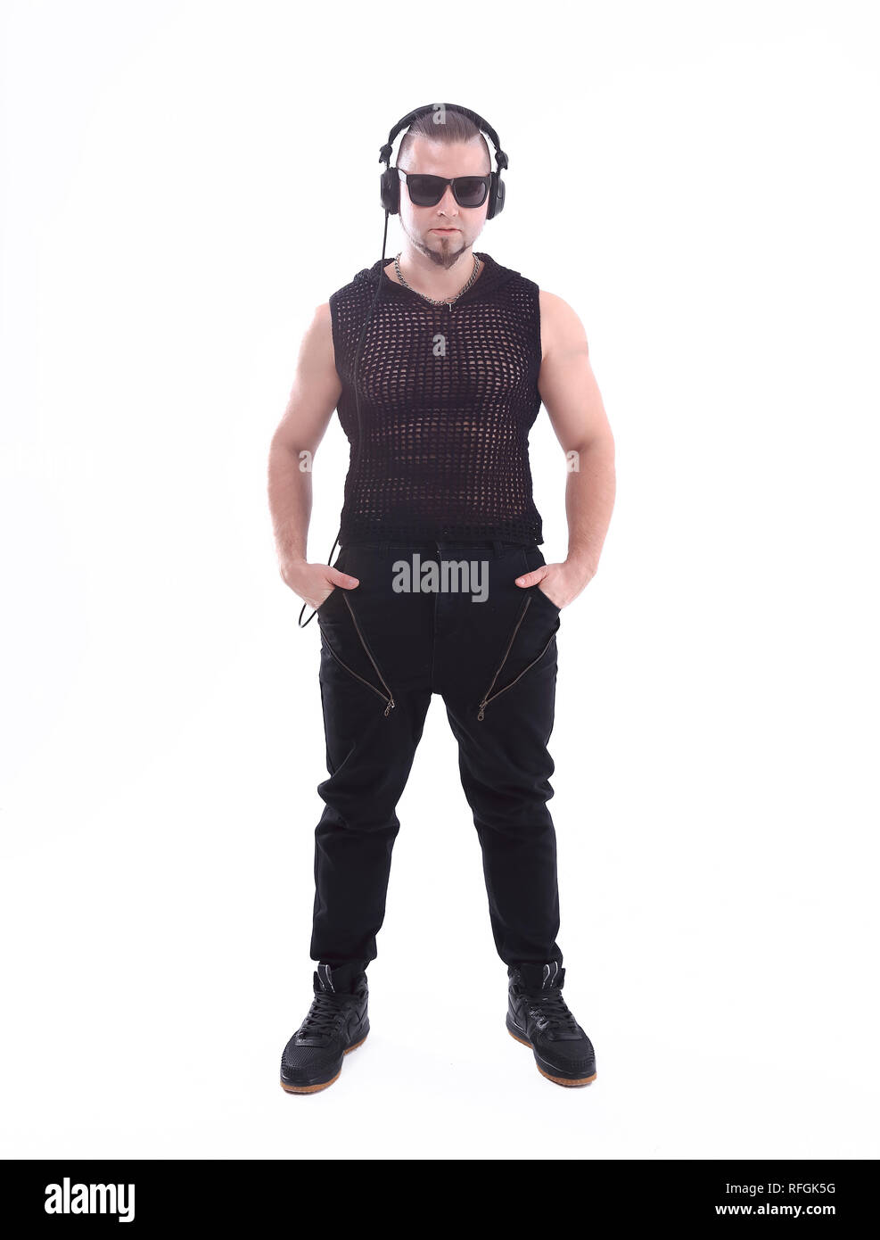 in full growth .Studio portrait of a steep rapper DJ.isolated on white ...