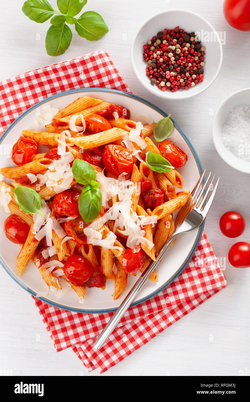 italian penne pasta with tomatoes parmesan basil Stock Photo - Alamy