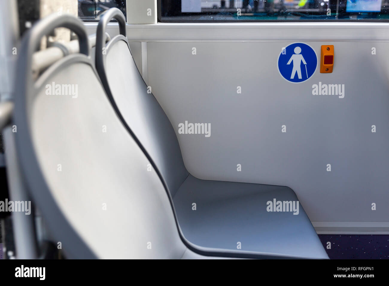 Red button STOP on the bus. Elderly (Old) People Symbol. Bus seats. New ...