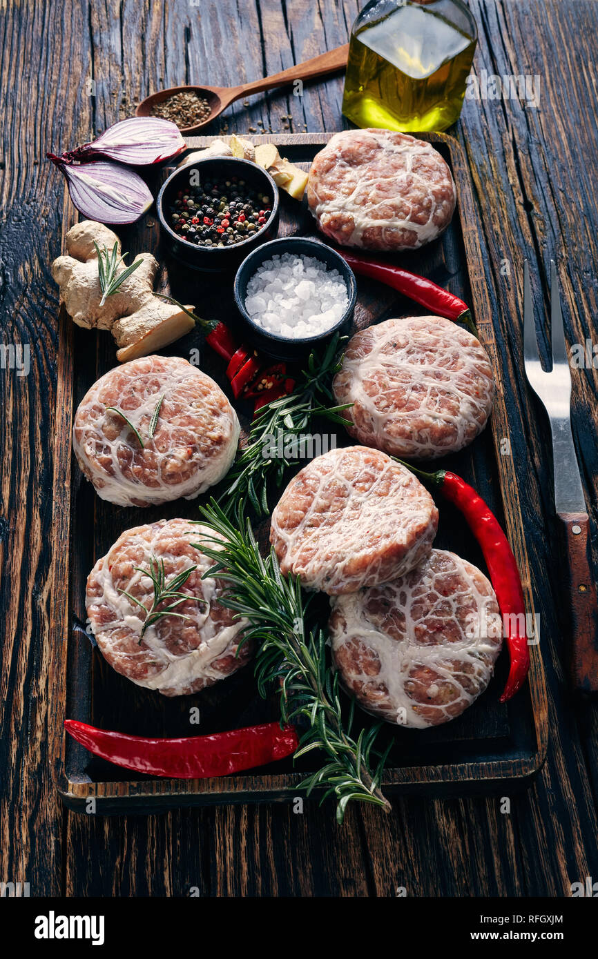 meat patties - raw Atriaux of ground pork wrapped in caul fat, swiss ...
