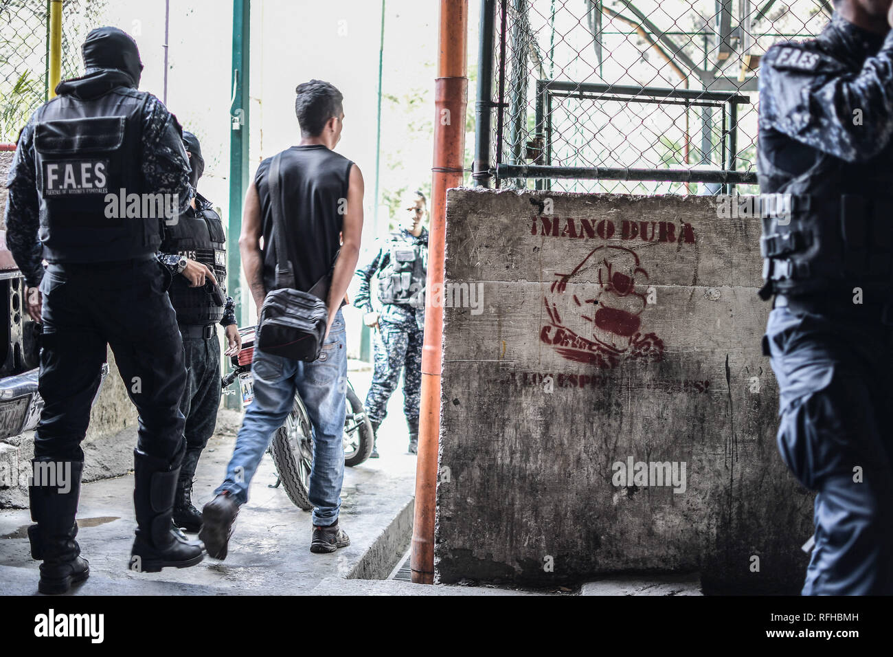 Caracas, Venezuela. 25th Jan, 2019. A member of a criminal group seen ...