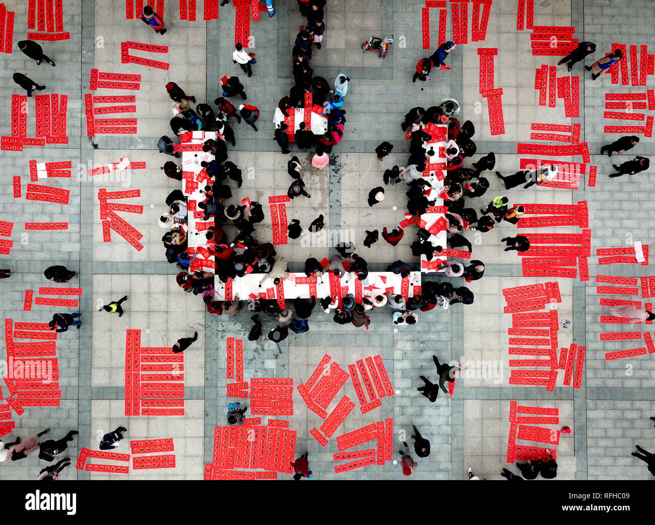 Beijing, China's Jiangxi Province. 25th Jan, 2019. Calligraphers write ...