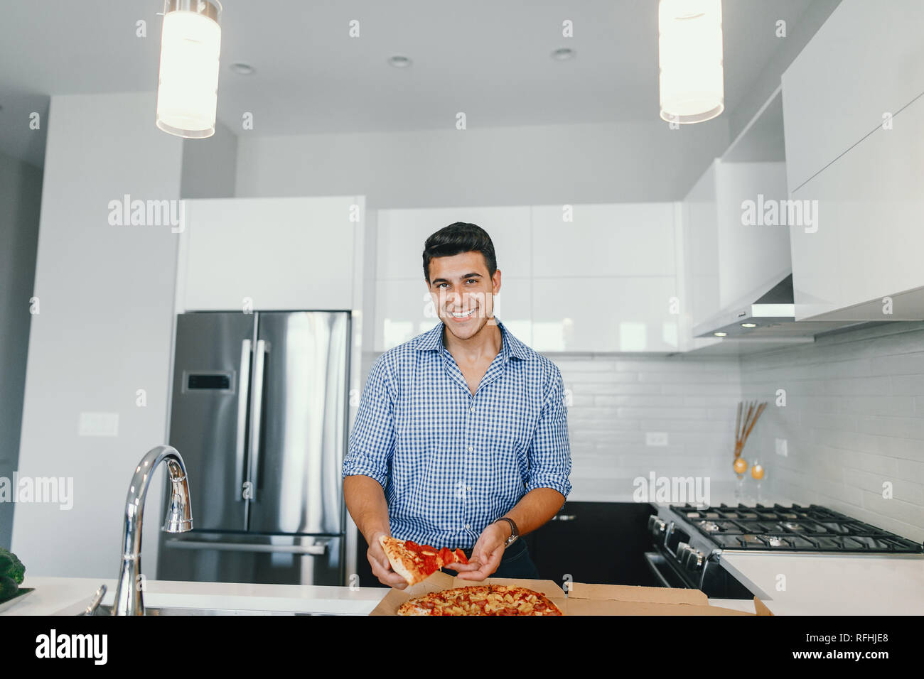 man with pizza Stock Photo - Alamy