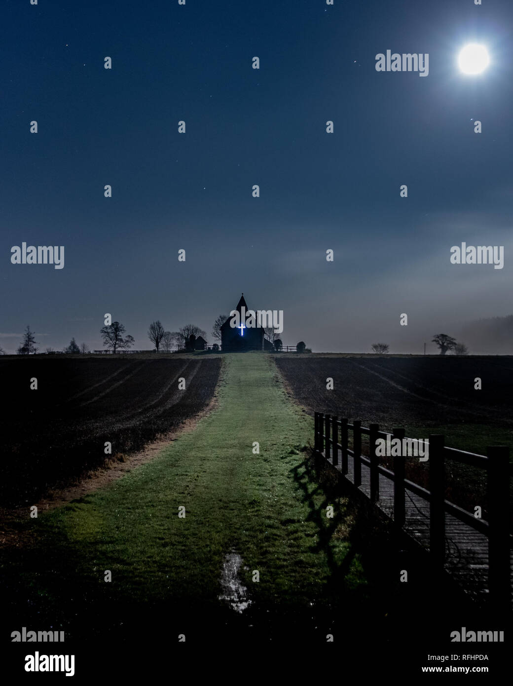 St Hubert's church during a full moon, Idsworth, Hampshire, UK Stock ...