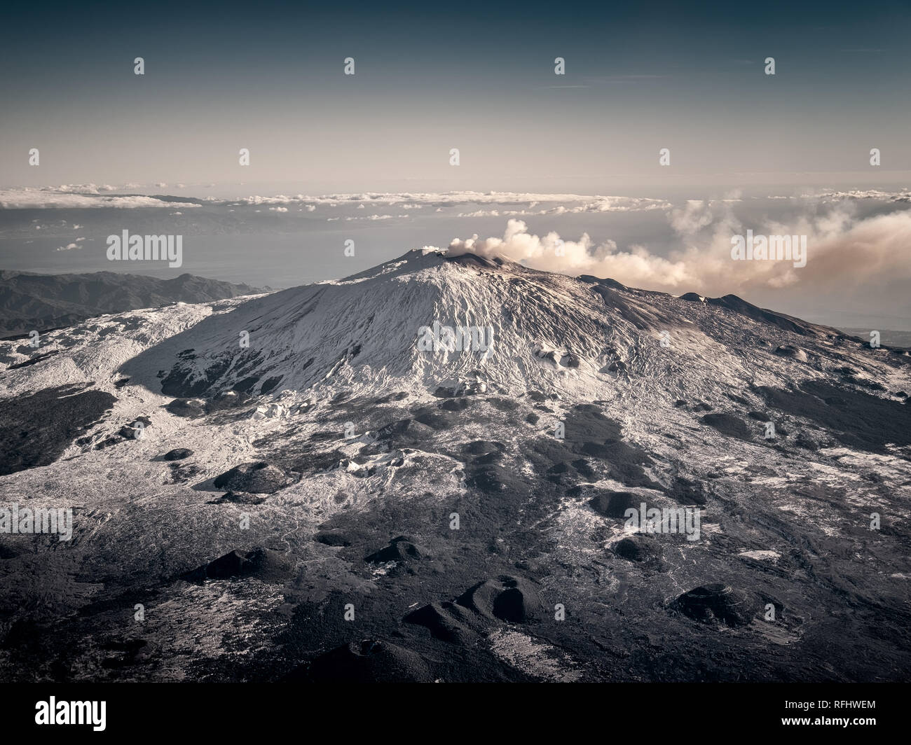 Ash plume coming from volcano mount Etna during the eruption of ...