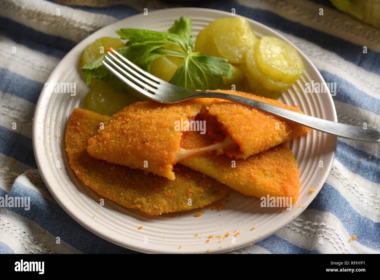 Fried panzerotti filled with tomato sauce and cheese - Italian Food ...