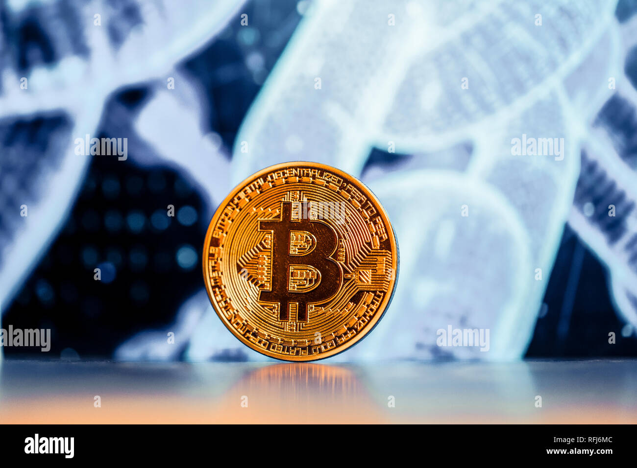 Bitcoin on blue chart hi-res stock photography and images - Alamy