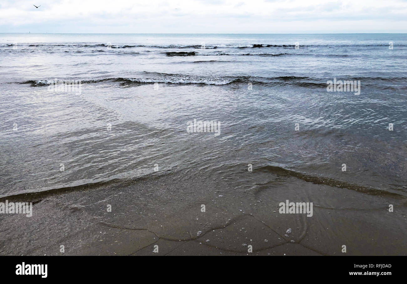 Cold winter Black sea water from sand beach Stock Photo - Alamy