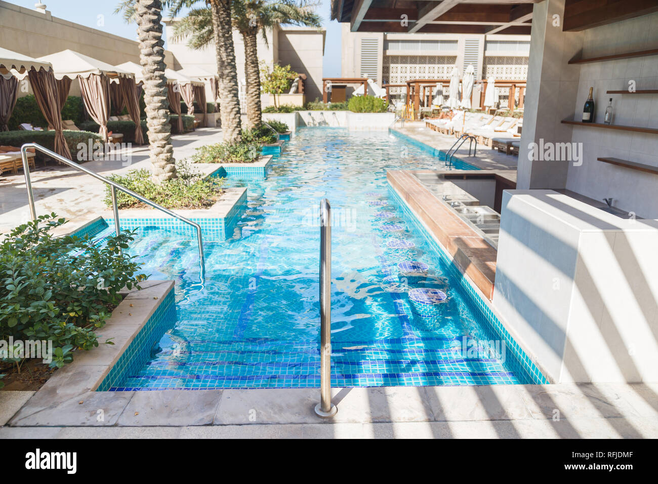 Outdoor swimming pool with clean water Stock Photo - Alamy