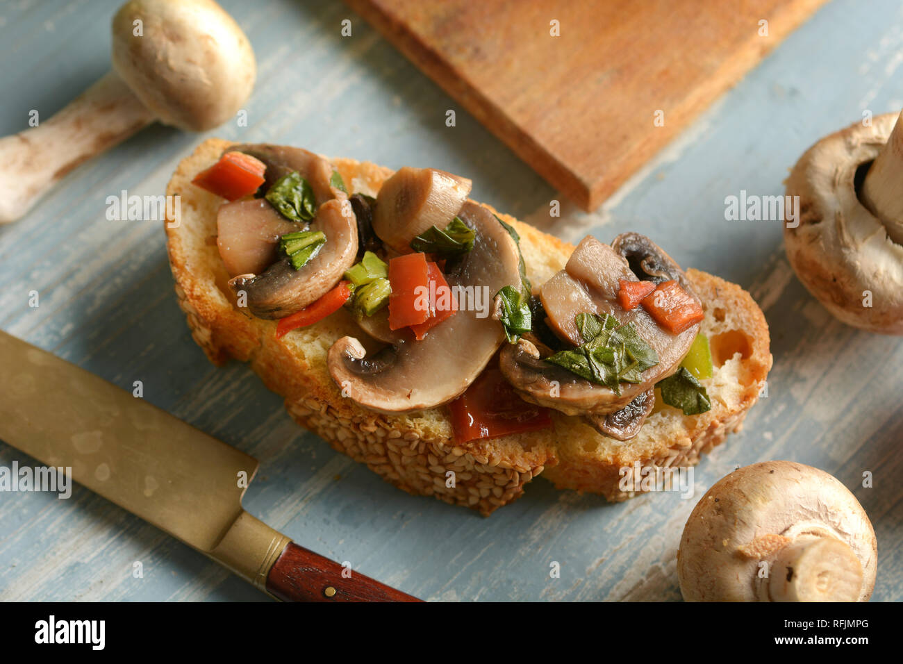 Rustic Toast bread with mushrooms and vegetables assorted - closeup ...