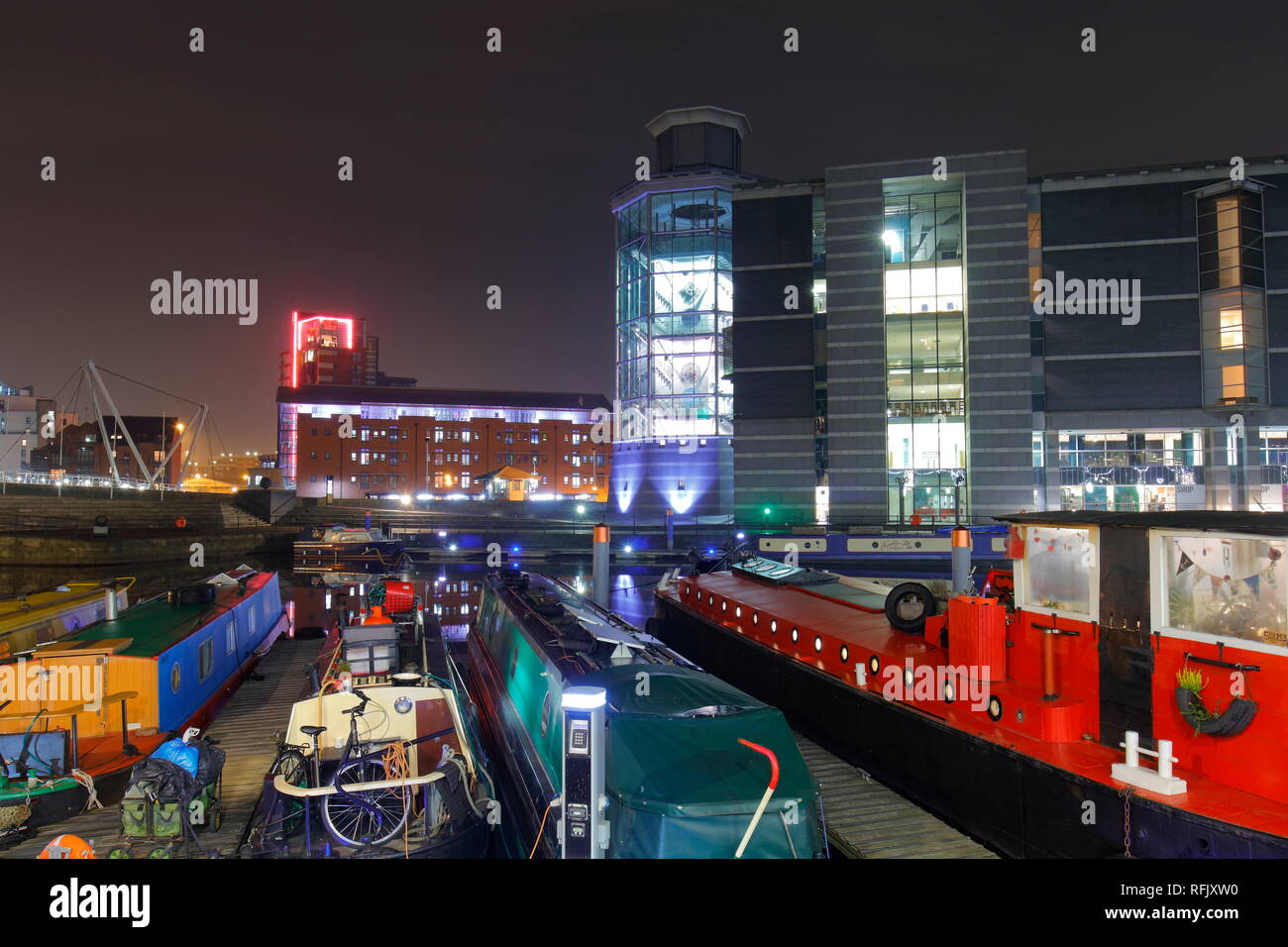 Narrowboats moored up outside the Royal Armouries Museum at Leeds Dock ...