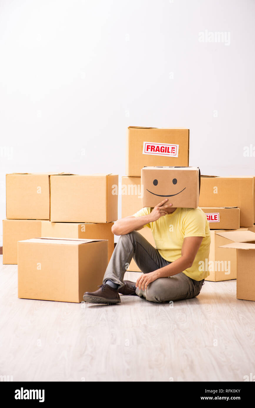 Happy man with box instead of his head Stock Photo - Alamy