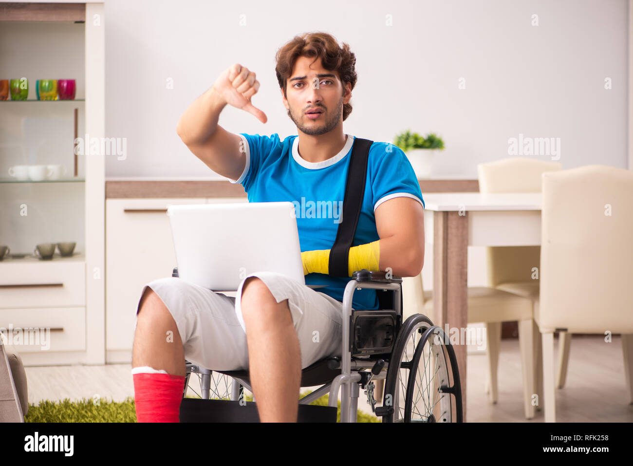 Injured man recovering from his injury Stock Photo - Alamy