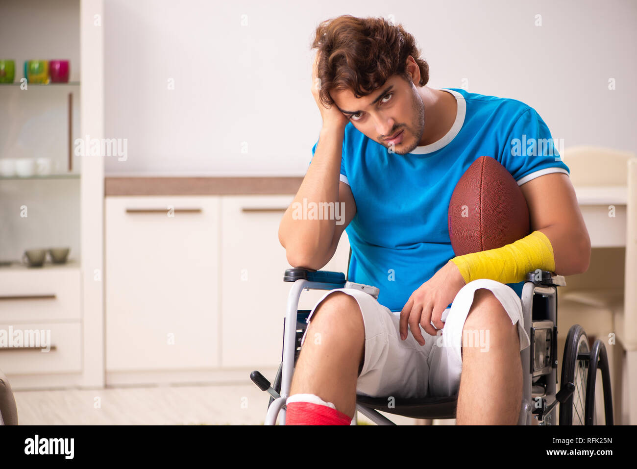 Injured man recovering from his injury Stock Photo - Alamy