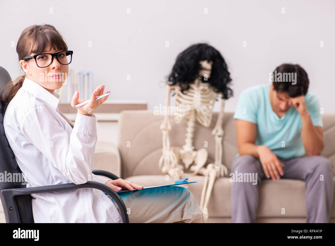 Young patient visiting psychologist for therapy Stock Photo - Alamy