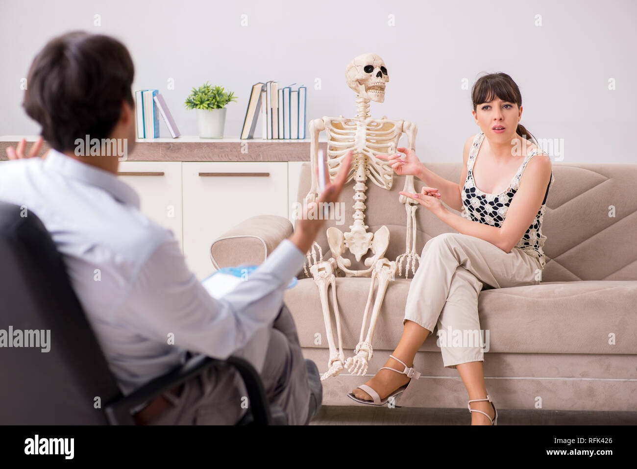 Young patient visiting psychologist for therapy Stock Photo - Alamy