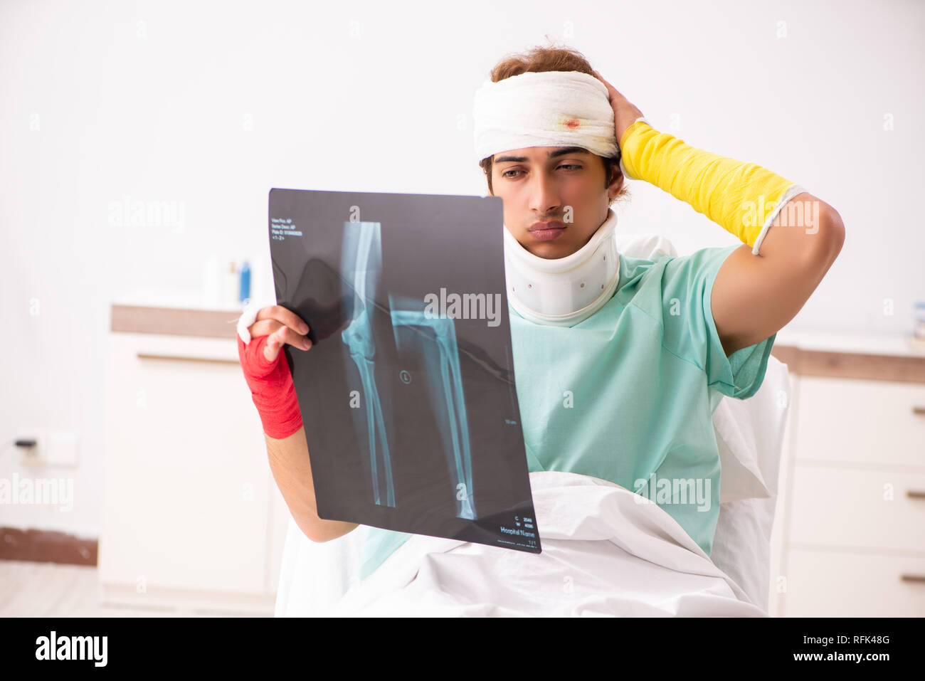Young injured man staying in the hospital Stock Photo - Alamy