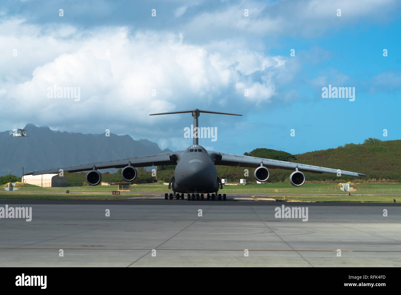 A C-5 Super Galaxy assigned to Dover Air Force Base taxis on the runway ...