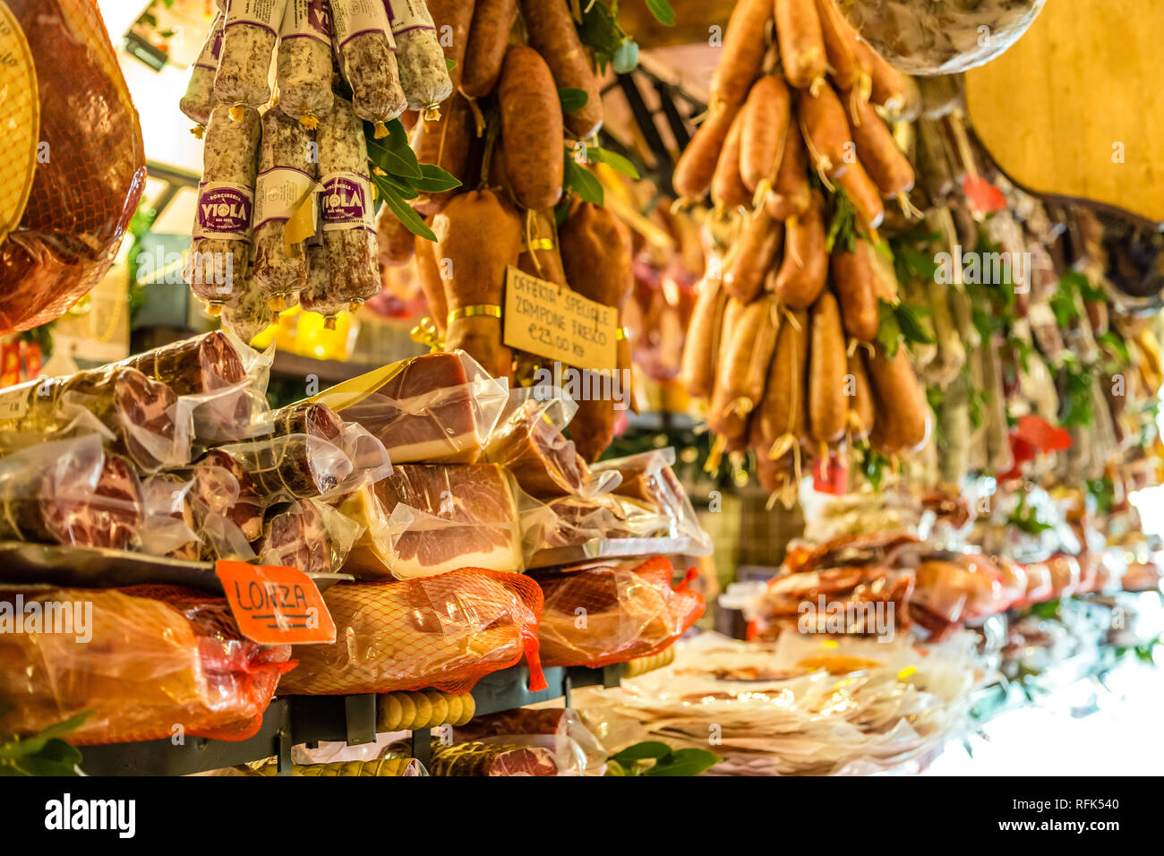 ROME, ITALY - JANUARY 2, 2019: light is enlightening hanged salami for ...