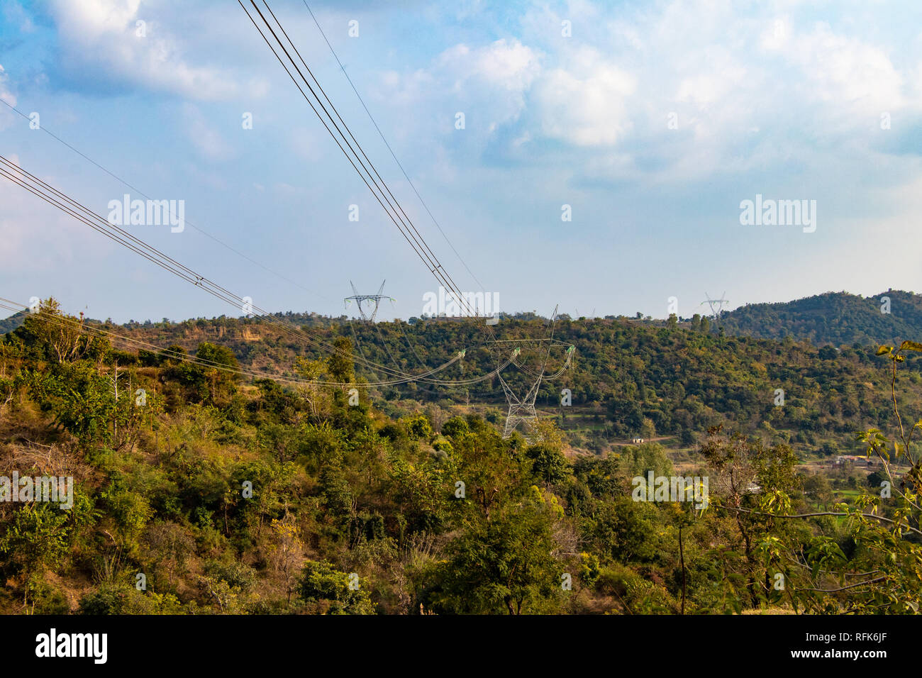 High voltage tower, electric transmission tower in hill area ...