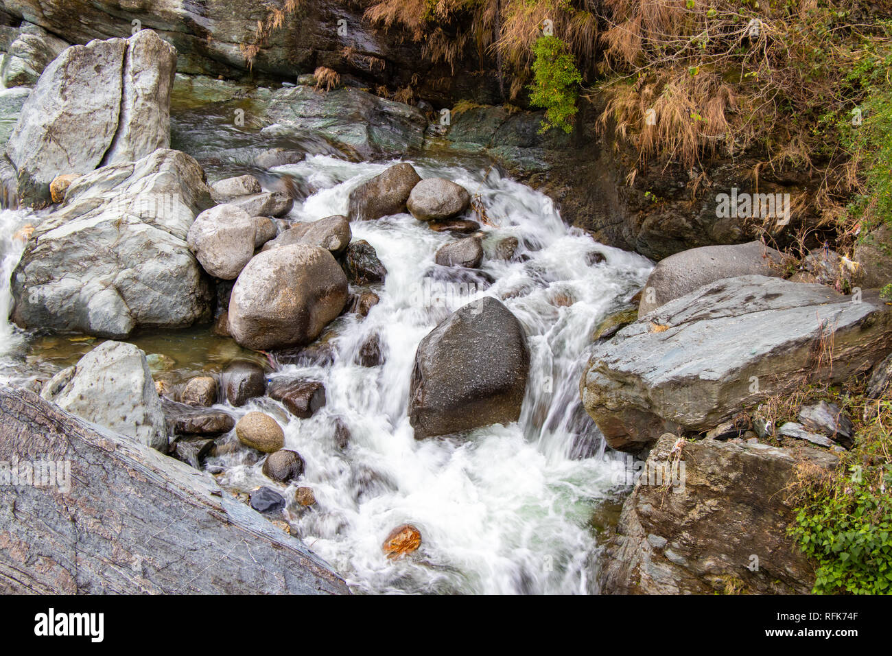Flowing stream through green mossy rocks in forest, moss on rocks ...
