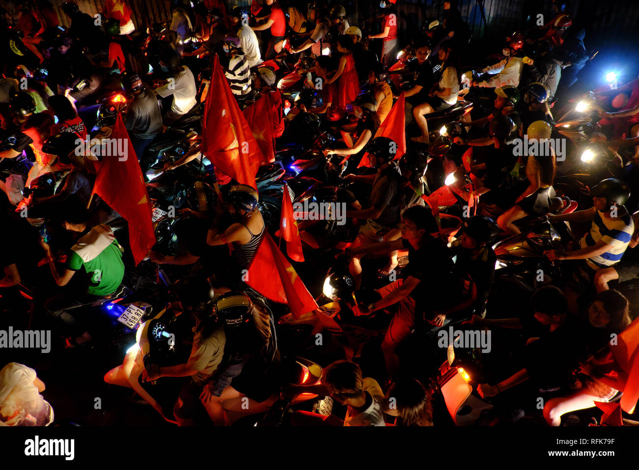 HO CHI MINH CITY, VIET NAM- DEC 15, 2018: Crowded Vietnamese street at ...