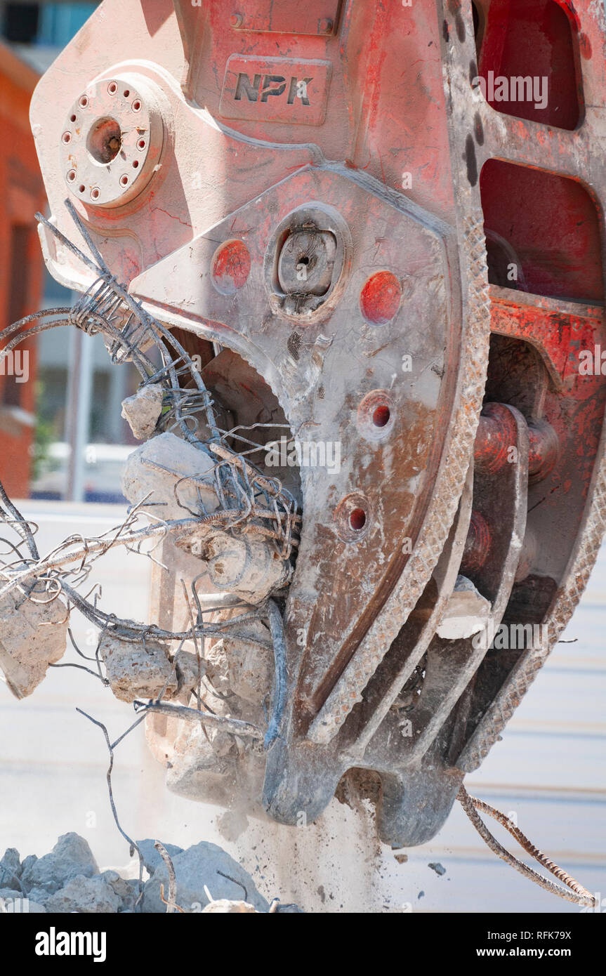 Close-up of Concrete Cracker grinding reinforced concrete from the ...