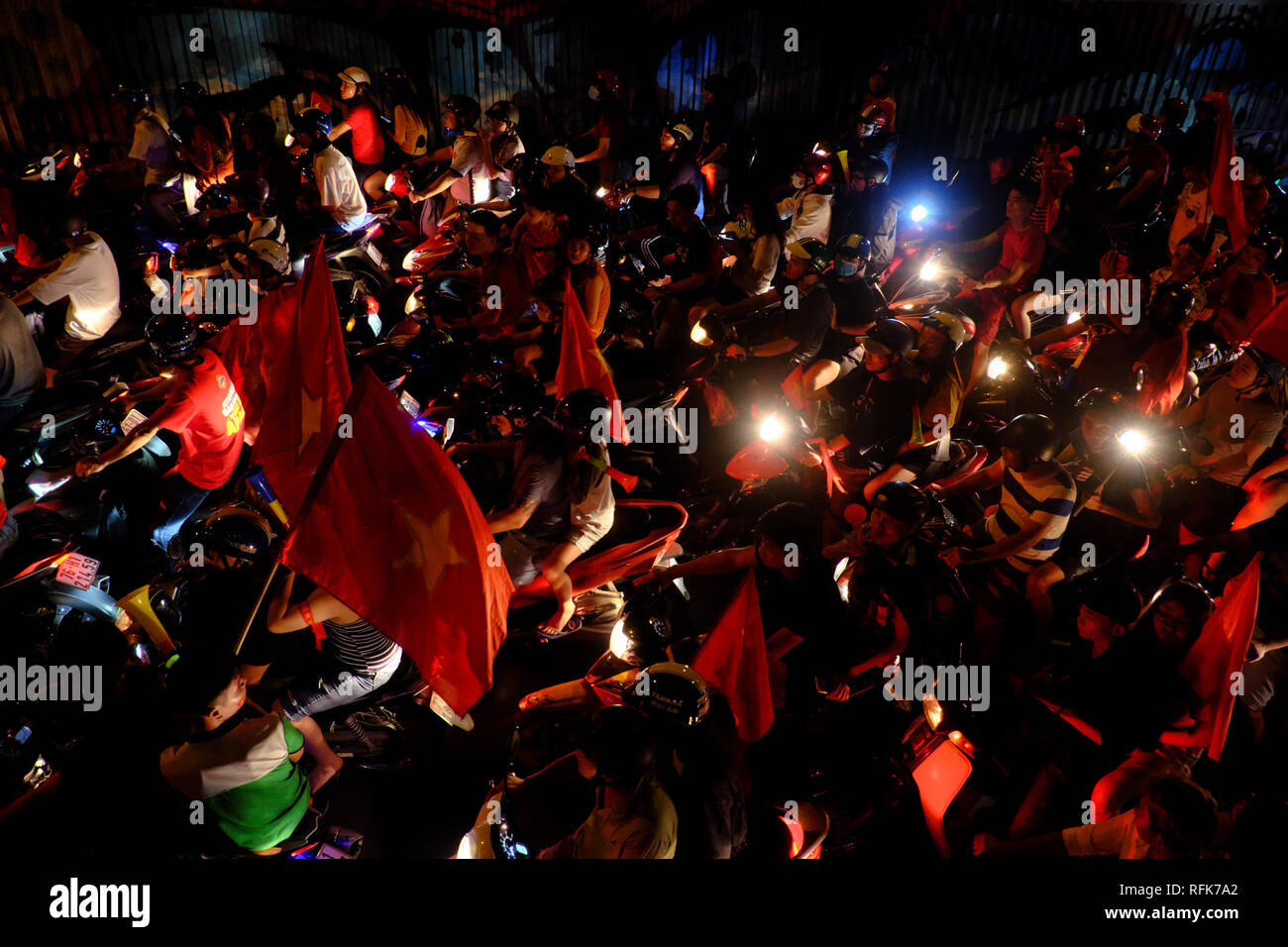 HO CHI MINH CITY, VIET NAM- DEC 15, 2018: Crowded Vietnamese street at ...