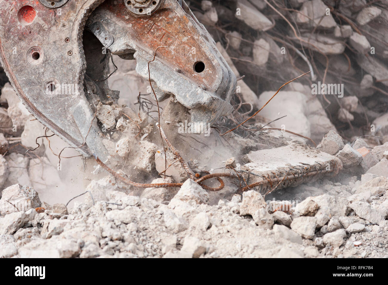 Close-up of Concrete Cracker grinding reinforced concrete from the ...