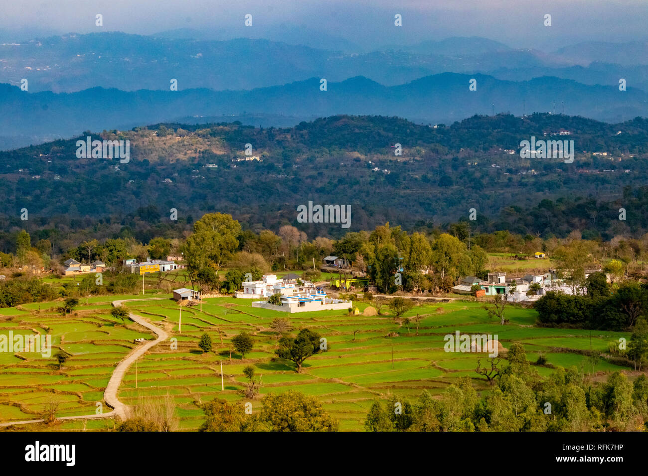 Farm on top of a green hill and countryside houses view from top ...