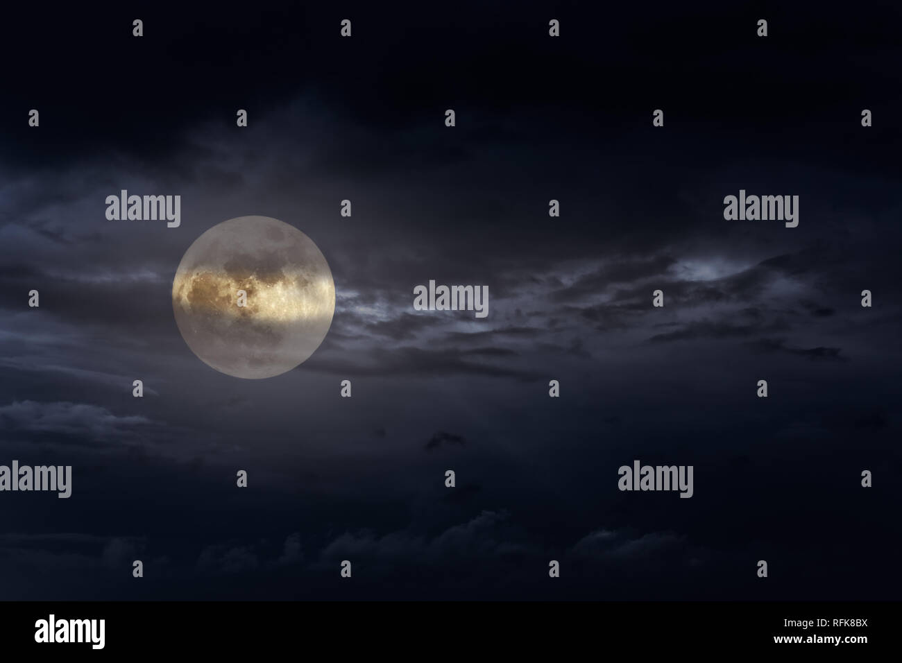 Cloudy full moon night sky Stock Photo - Alamy