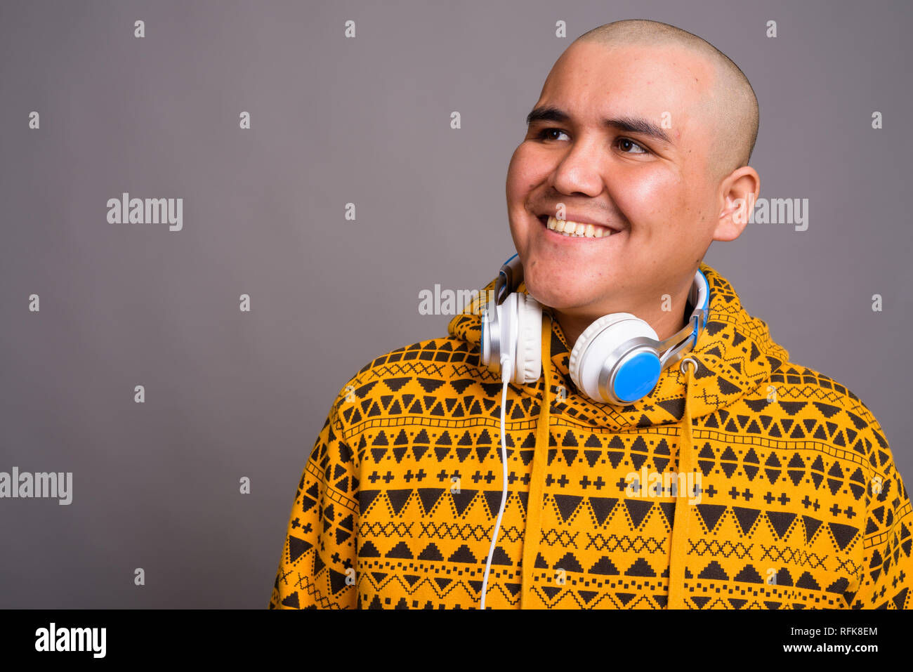 Happy asian man wearing headphones hi-res stock photography and images ...