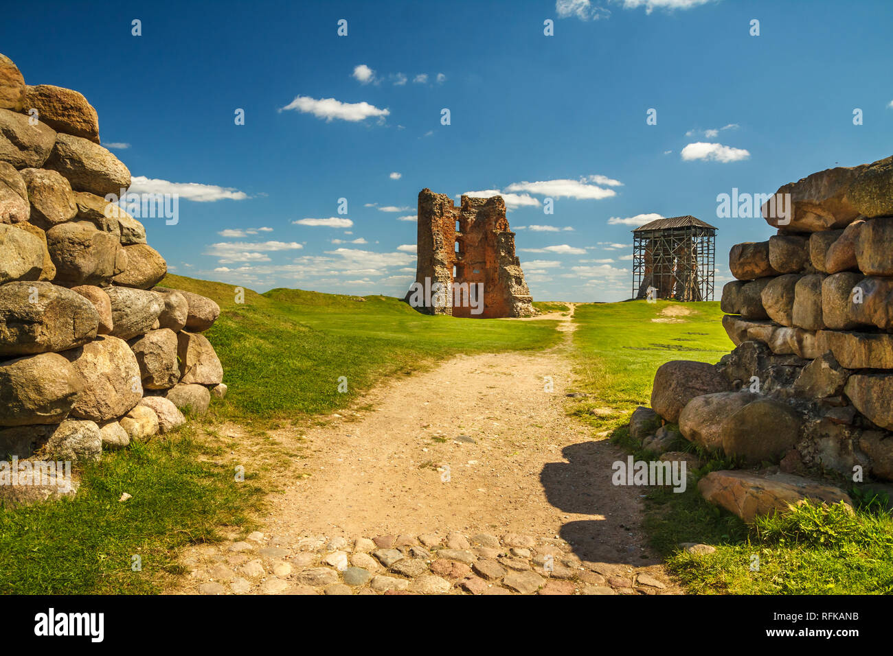Broken Gate to ruins of an ancient medieval abandoned knight castle of ...