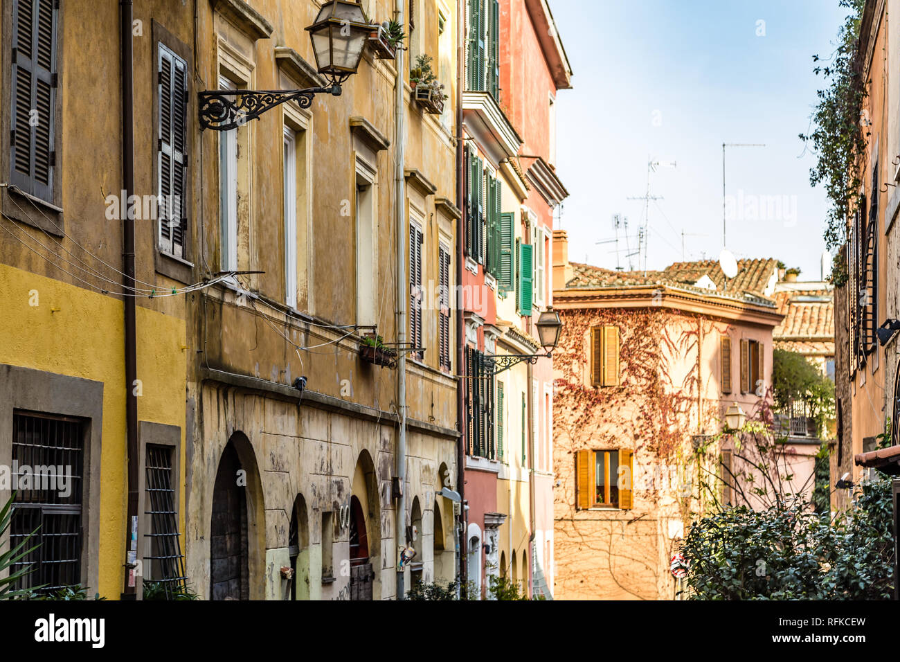 typical ancient buildings in fascinating street of Rome Stock Photo - Alamy