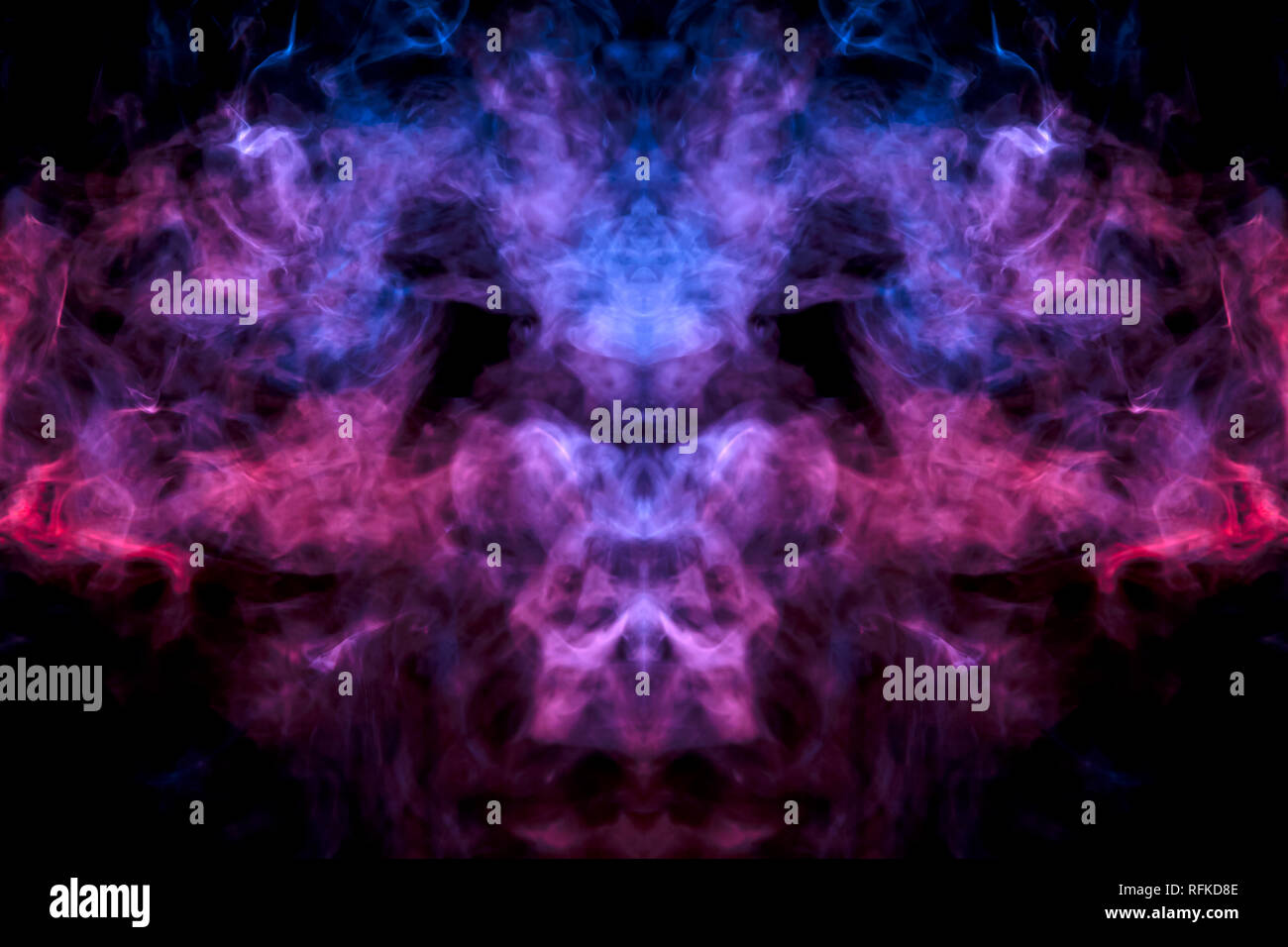 Abstract image of smoke of different colors in the form of horror or ...