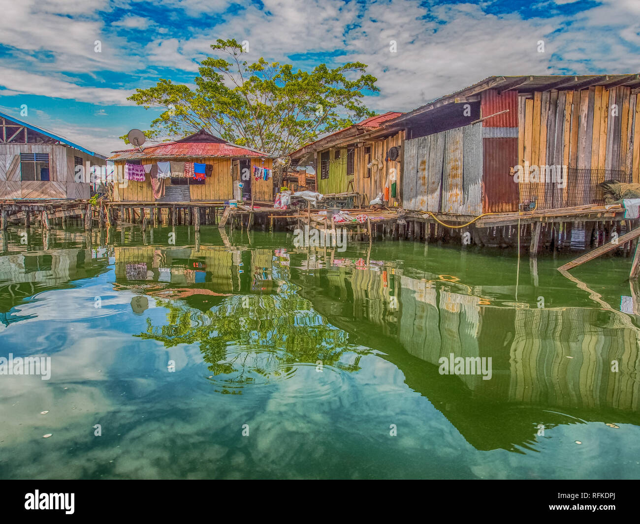Jayapura, Indonesia - January 24, 2015: Stilt houses in Kampung Ayapo ...