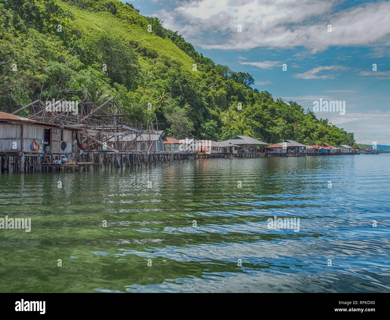 Jayapura, Indonesia - January 24, 2015: Stilt houses in Kampung Ayapo ...