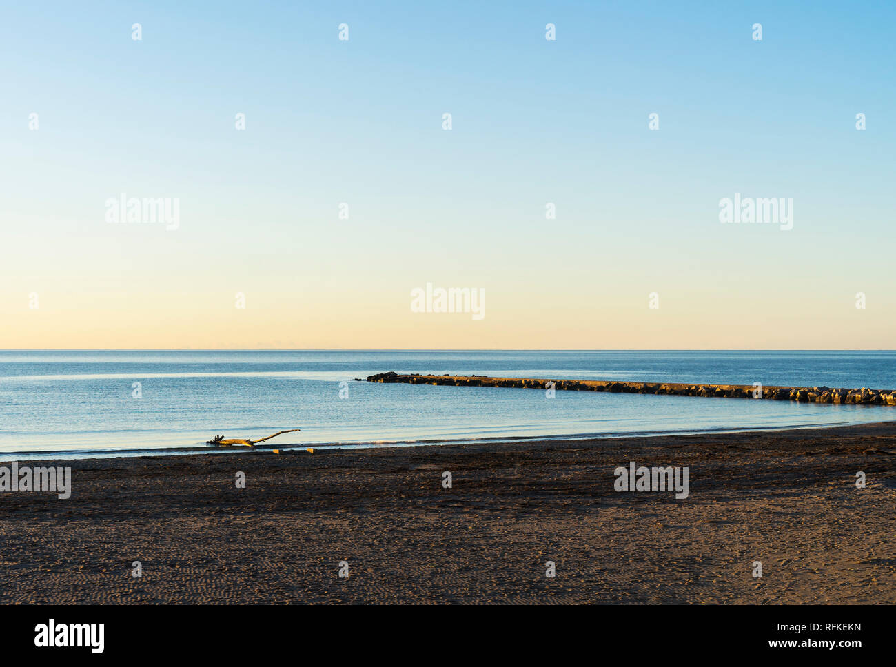 Small concrete dock over the mediterranean sea Stock Photo - Alamy