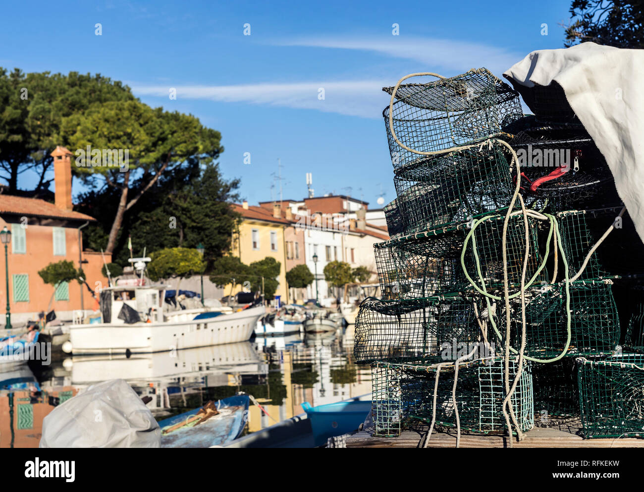 Small crab pots near a water canal Stock Photo - Alamy