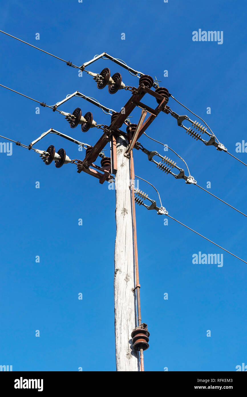 Small electric pole with ceramic discs Stock Photo - Alamy