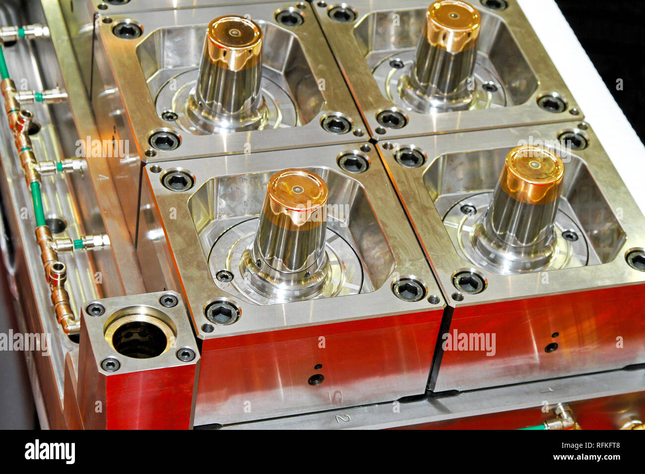 Four special forms for plastic cups production Stock Photo - Alamy