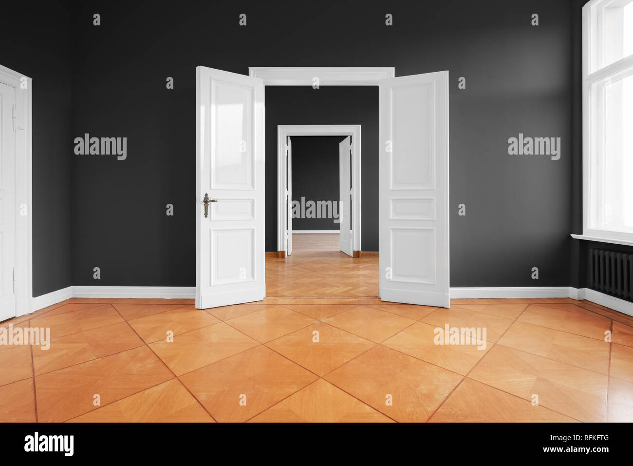 empty apartment room with open doors and parquet floor Stock Photo - Alamy