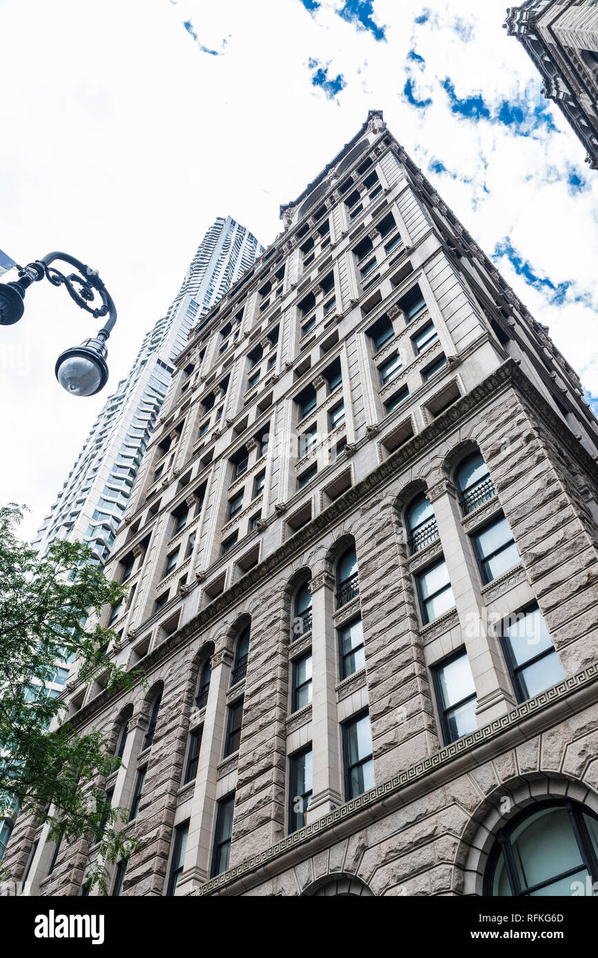 Facade of a modern and classic skyscrapers in Manhattan in New York ...