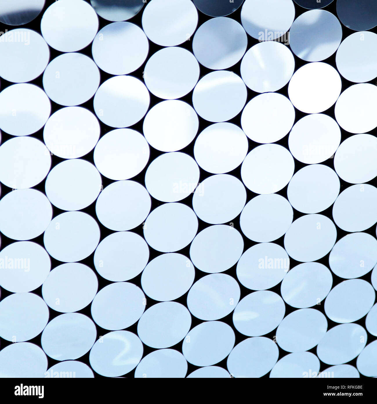 Wall of blue mirrors in a shape of circles Stock Photo - Alamy